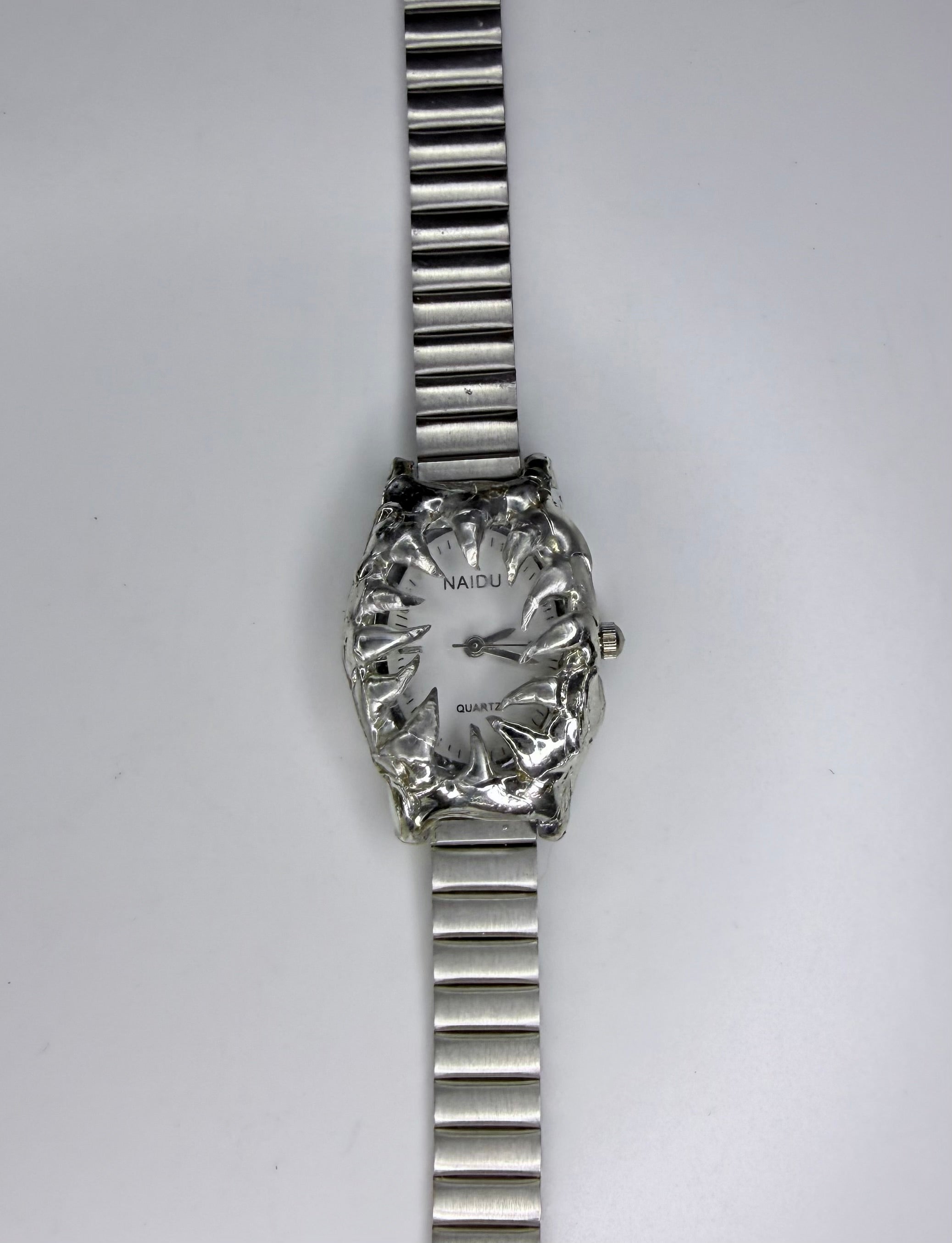 Spiked white watch – Scorchedvalley